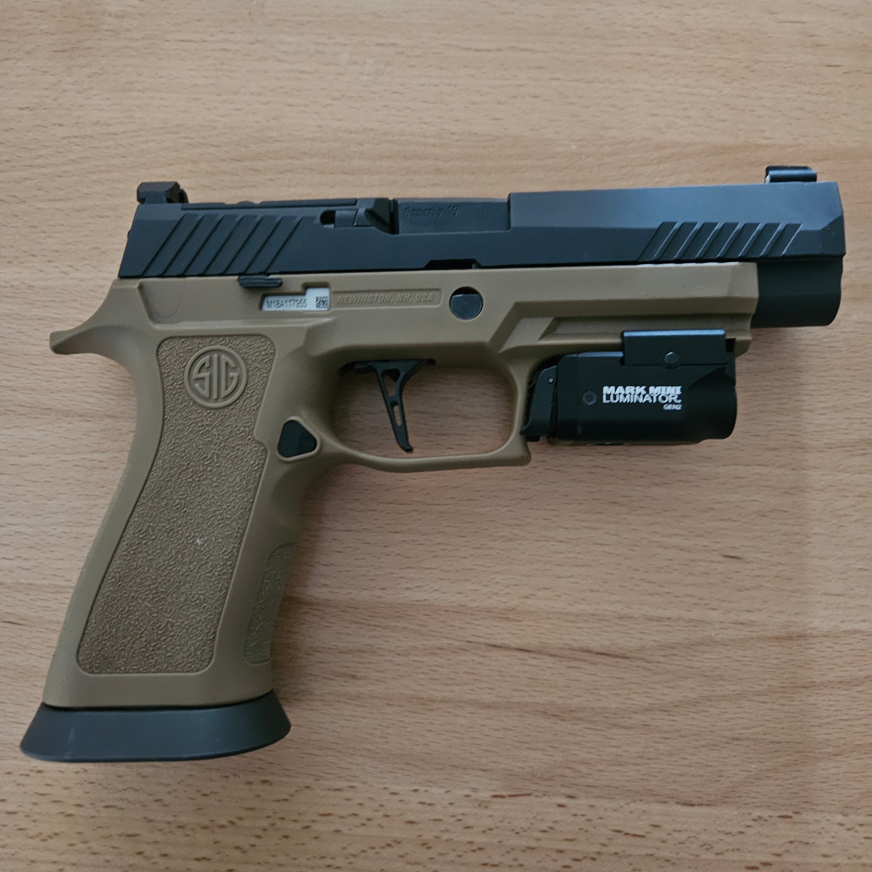 Mark Mini Pistol Light w/ NFA Tritium Night Sights w/ Orange Inserts.